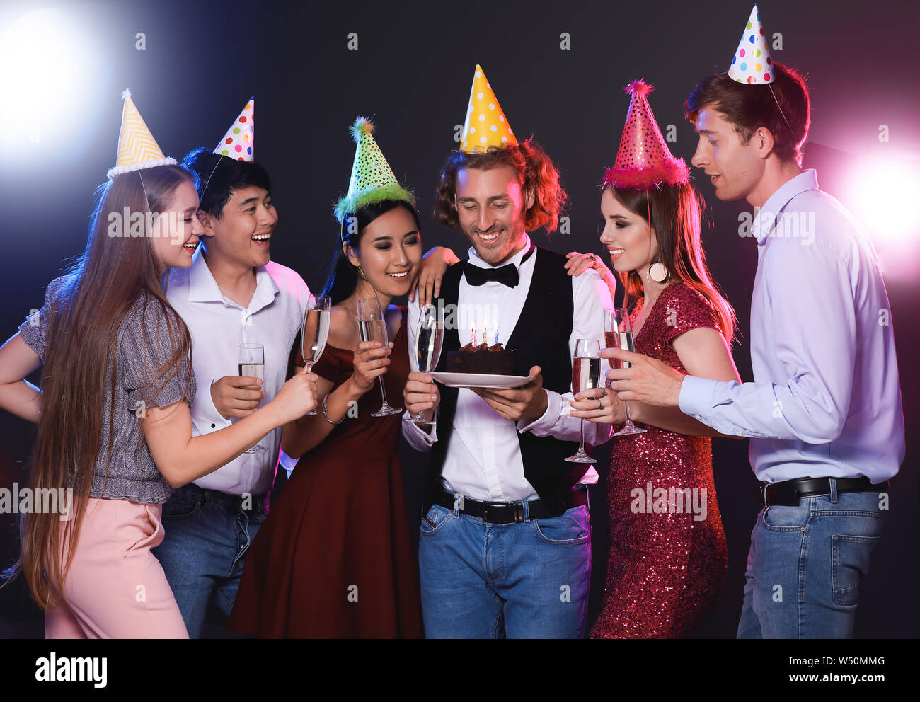 Group of friends celebrating Birthday in night club Stock Photo - Alamy