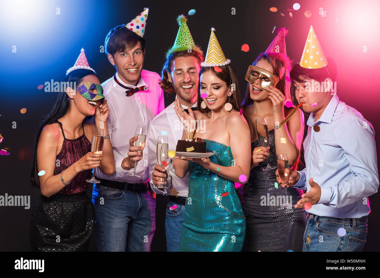 Group of friends celebrating Birthday in night club Stock Photo - Alamy