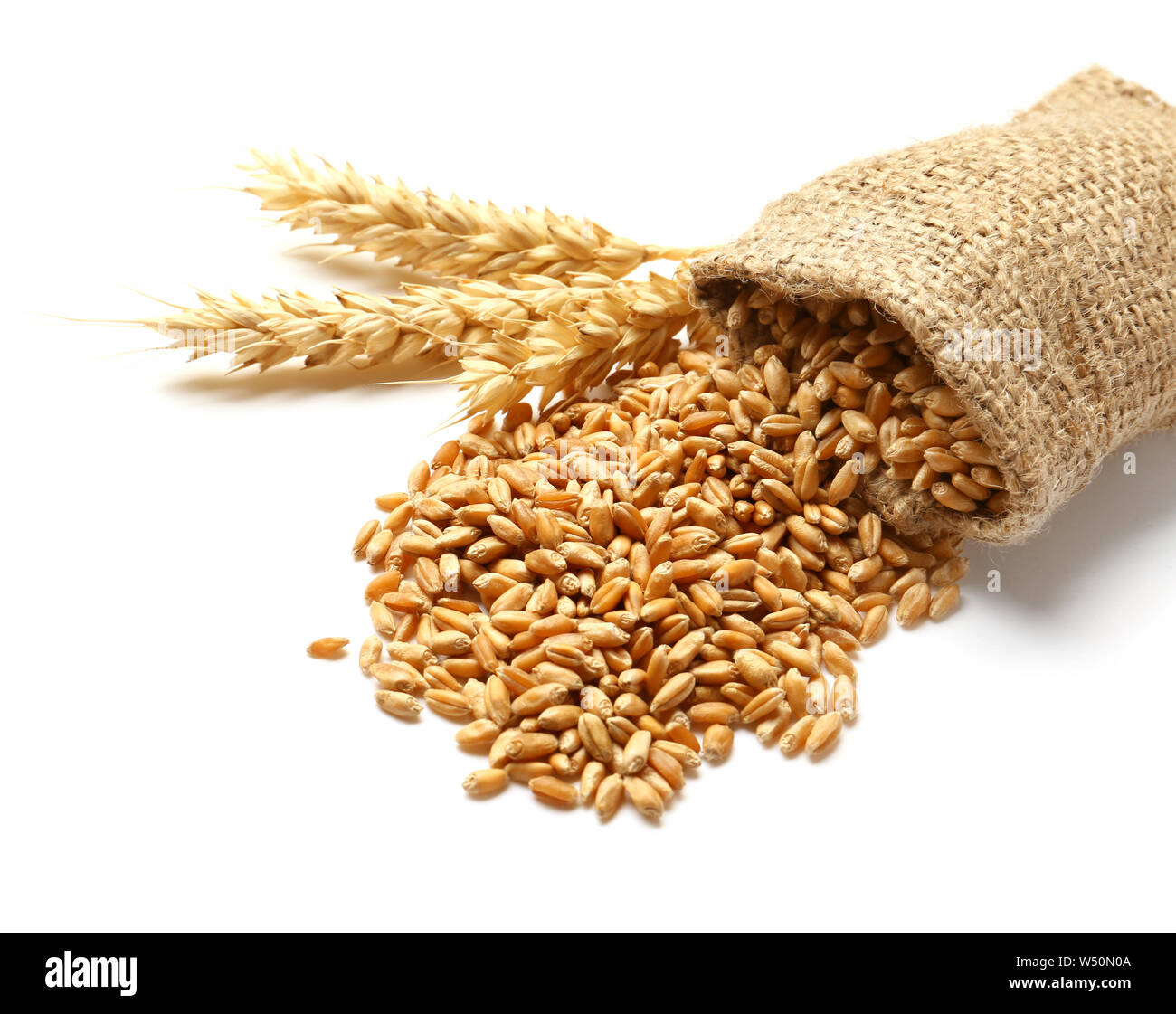 Sack with wheat grains on white background Stock Photo - Alamy
