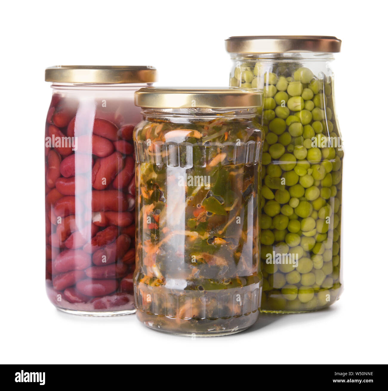 Jars with different canned vegetables and legumes on white background ...