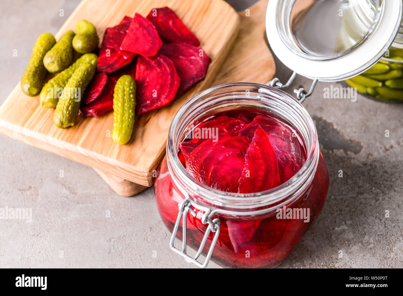 Jar with canned beetroot on grey background Stock Photo - Alamy