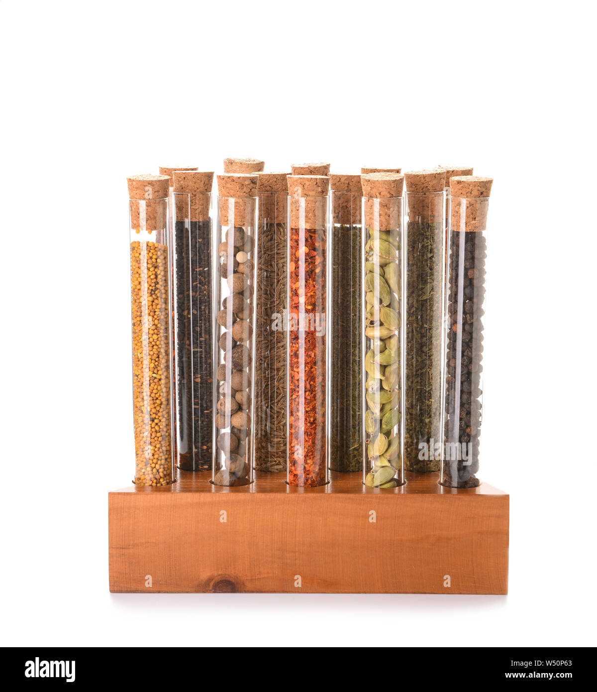 Assortment of spices in tubes on white background Stock Photo - Alamy