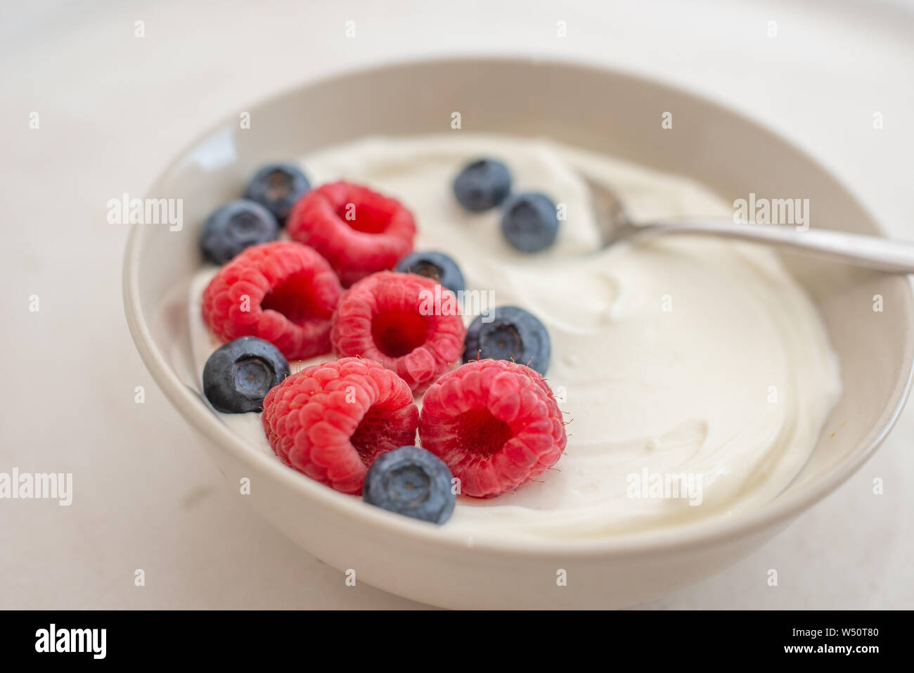 Yogurt with berries Stock Photo - Alamy