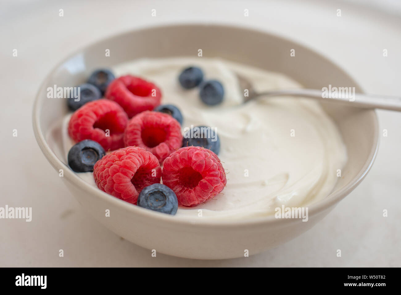 Yogurt with berries Stock Photo - Alamy