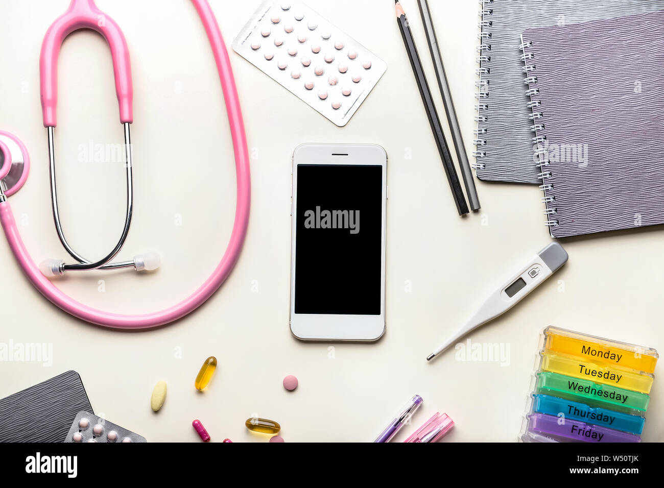 Workplace of medical doctor with mobile phone on white background Stock ...