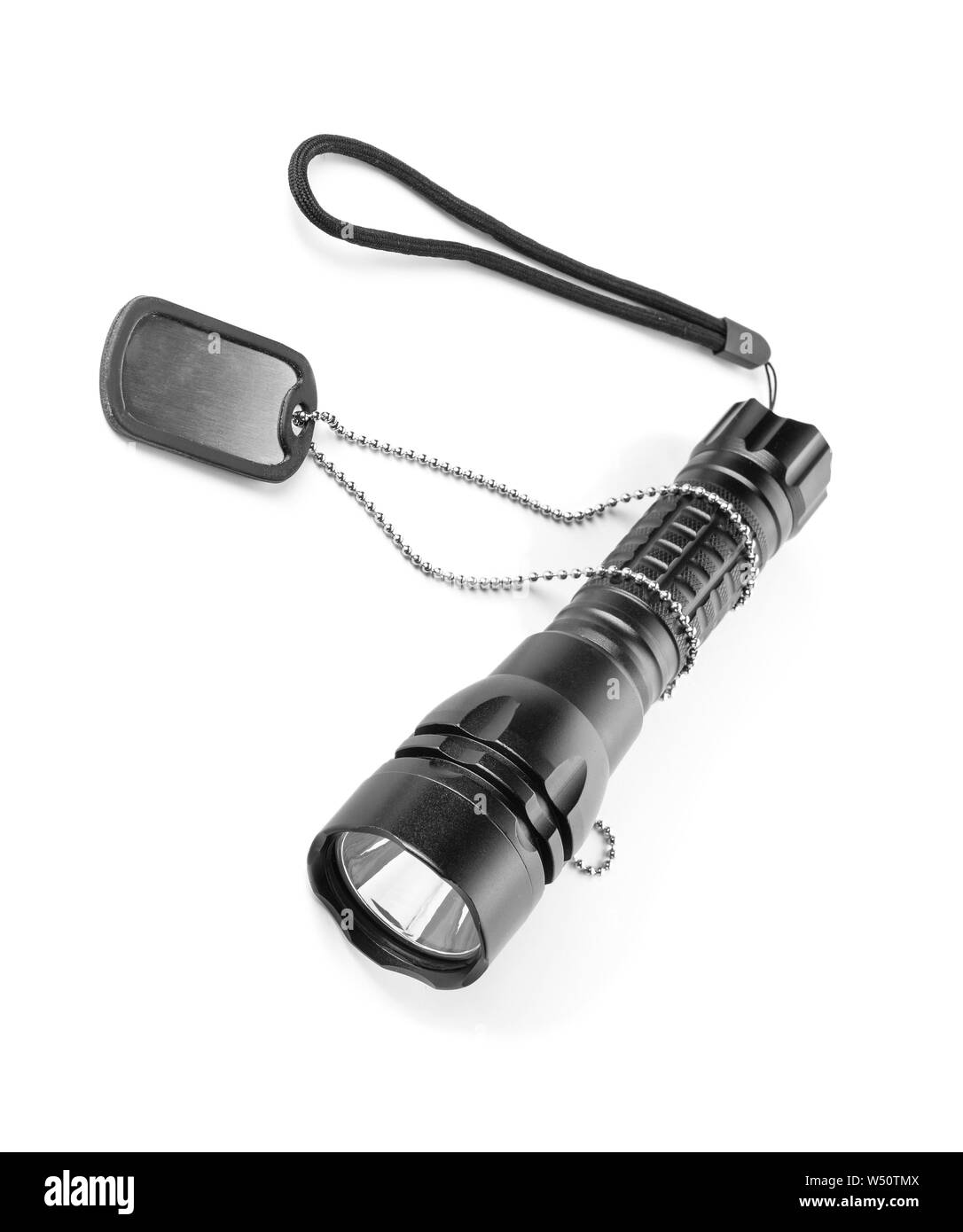 Modern flashlight and dog tag on white background Stock Photo - Alamy