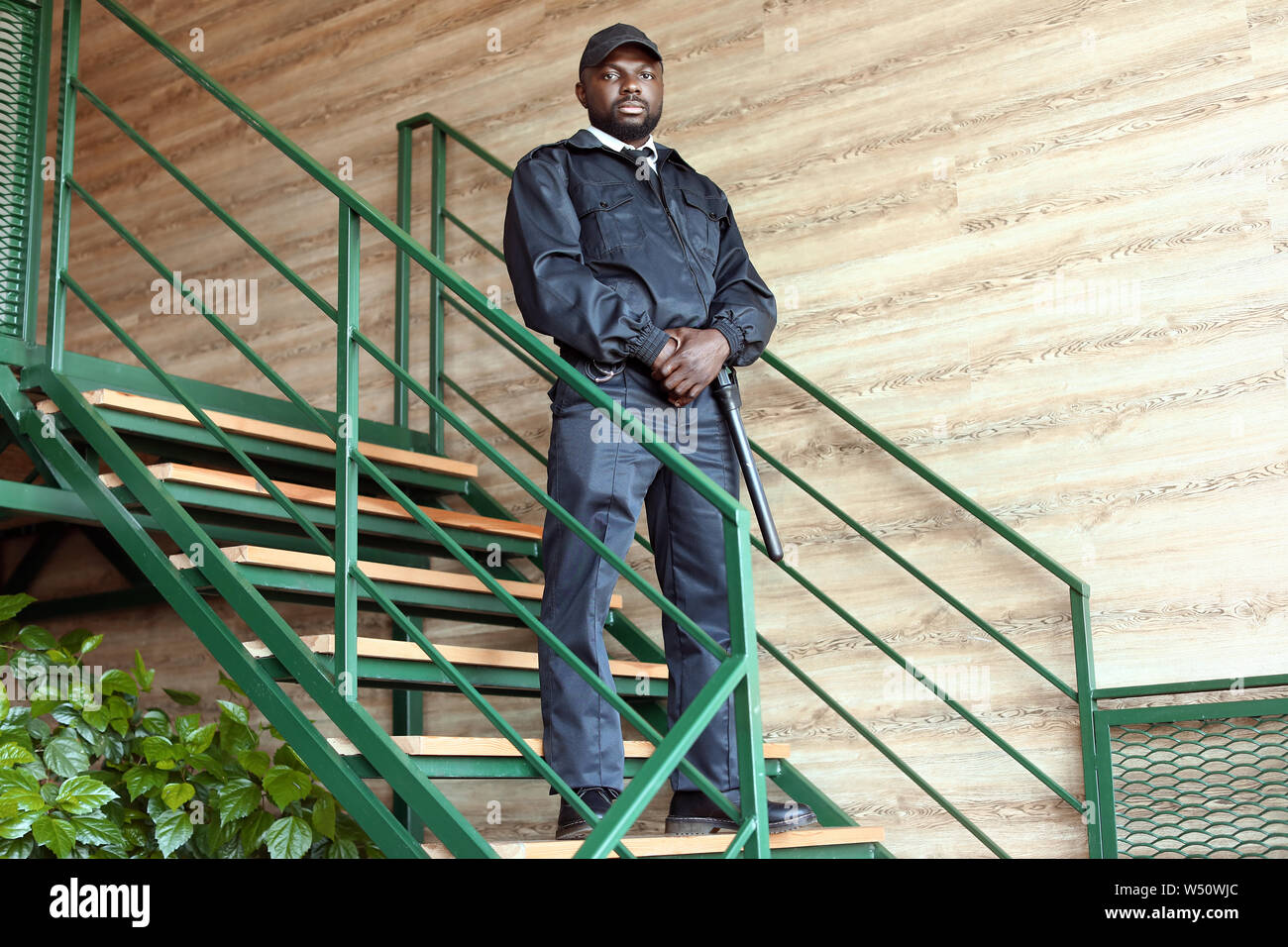 African-American security guard in building Stock Photo - Alamy