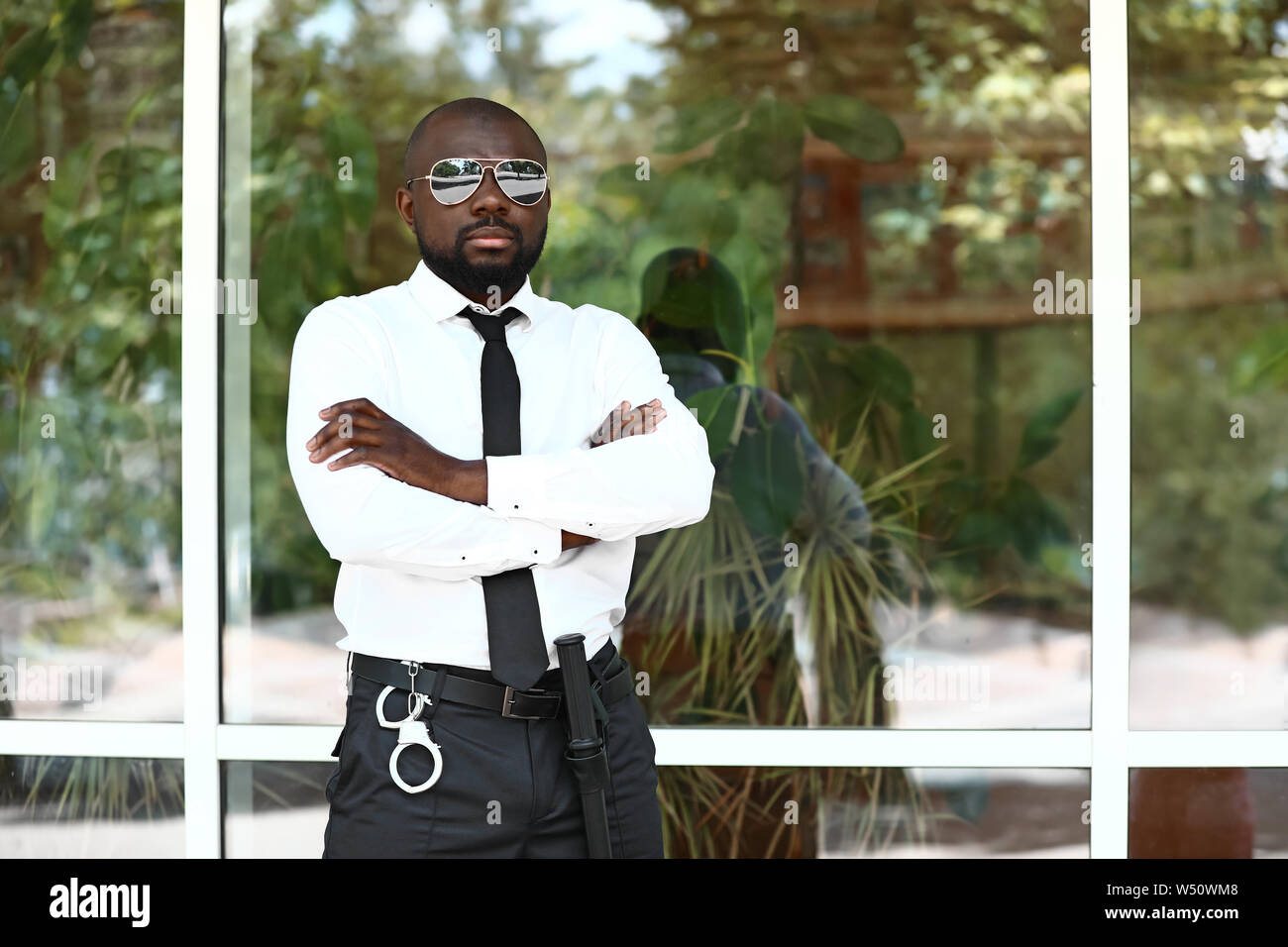 African-American security guard outdoors Stock Photo - Alamy
