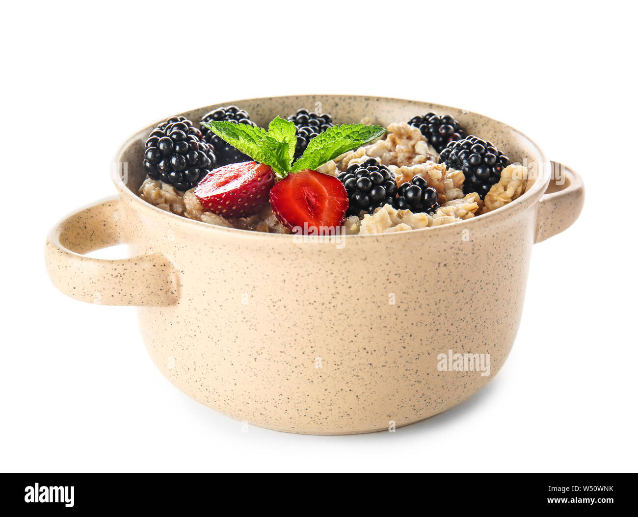 Pot with tasty sweet oatmeal on white background Stock Photo - Alamy