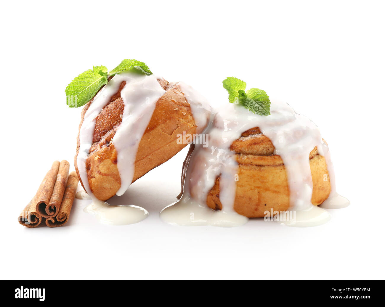 Tasty cinnamon rolls on white background Stock Photo - Alamy