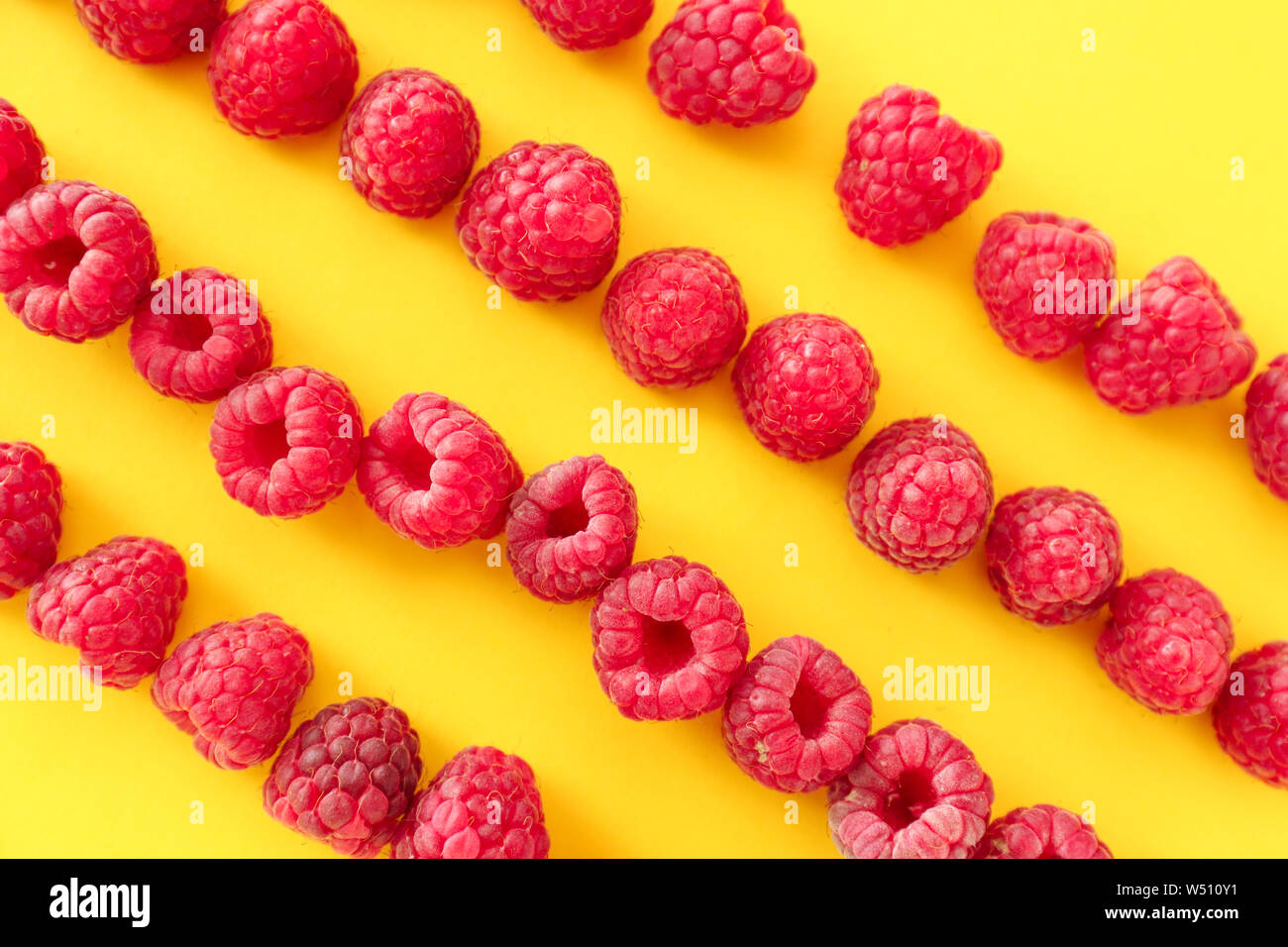 Sweet ripe raspberry on color background Stock Photo - Alamy