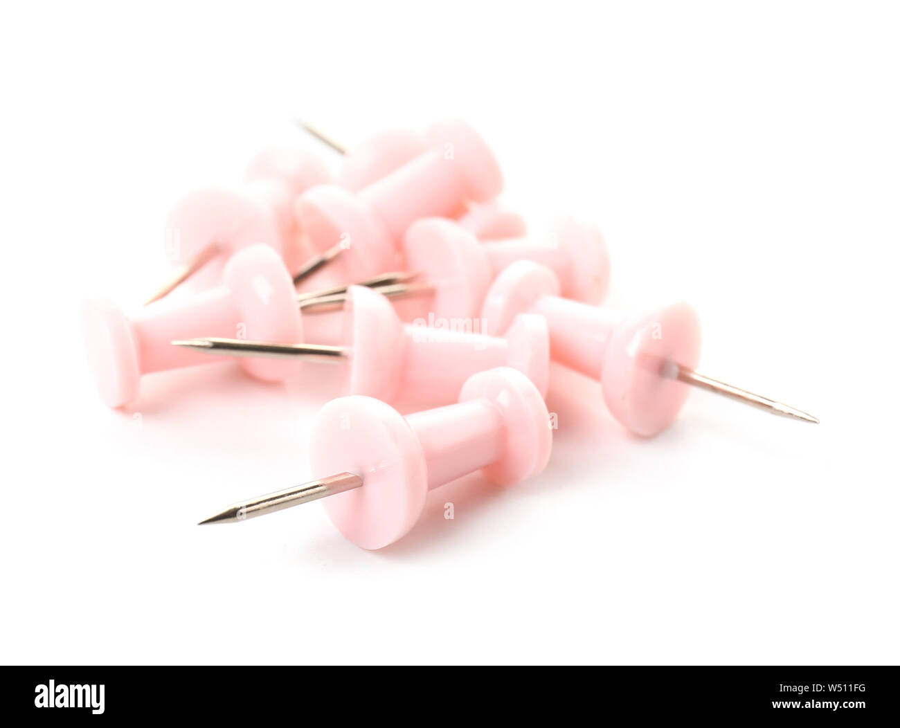 Drawing pins on white background Stock Photo - Alamy