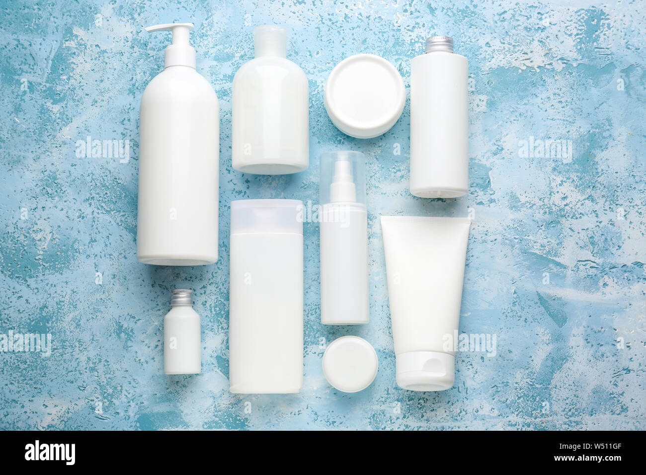Set of cosmetic products on color background Stock Photo - Alamy