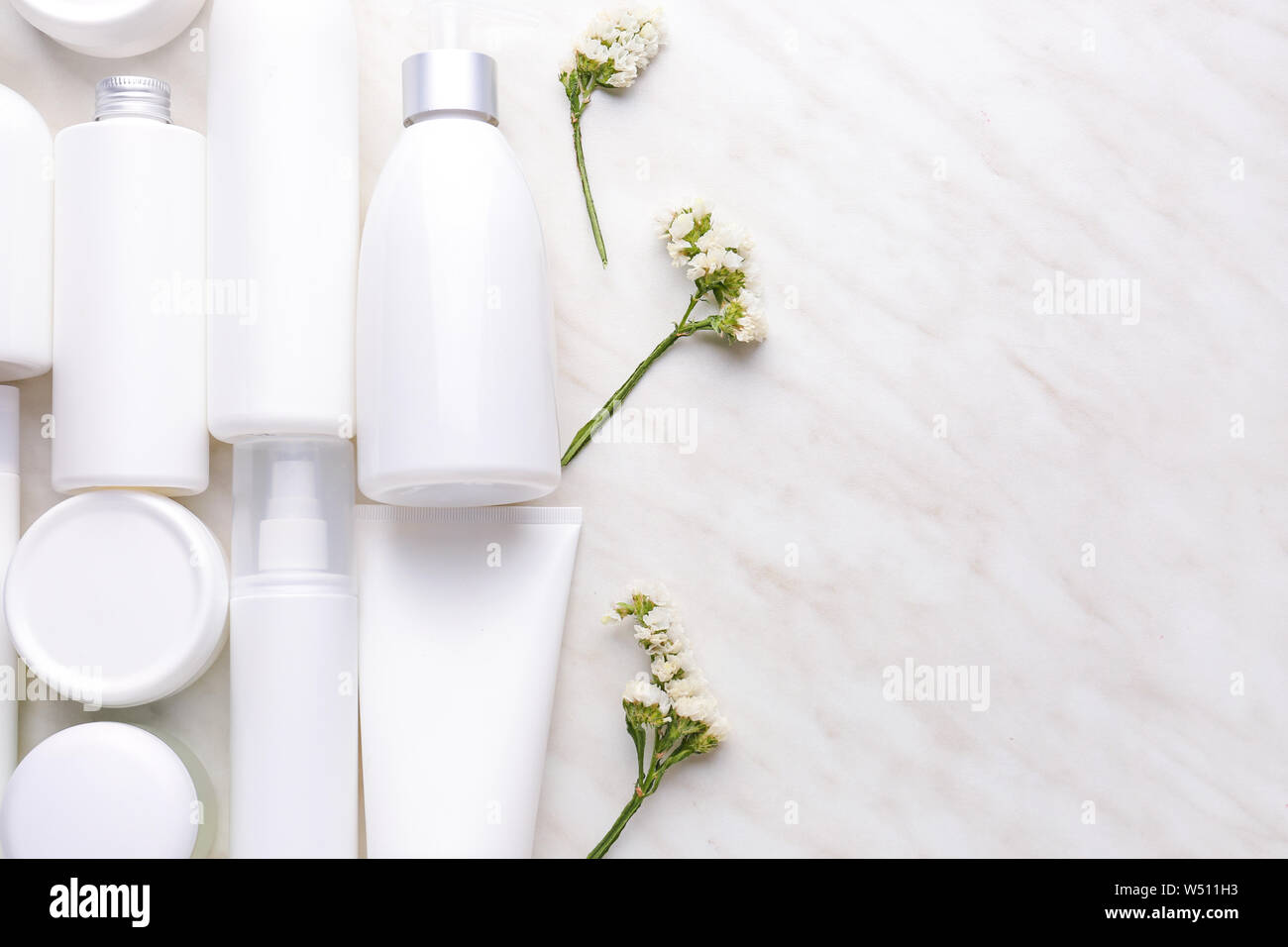 Set of cosmetic products on light background Stock Photo - Alamy