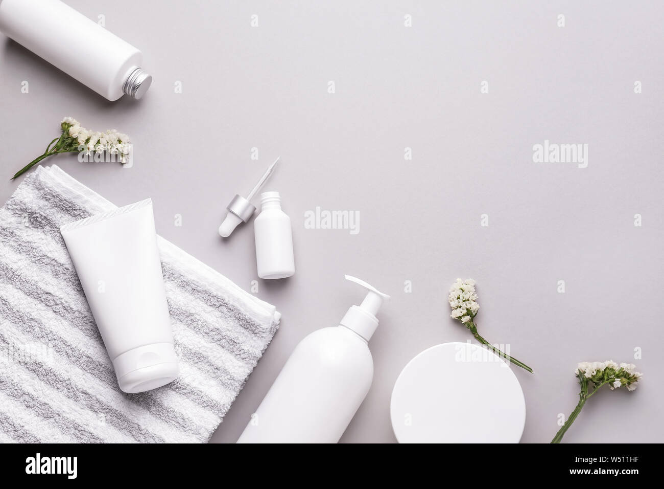 Set of cosmetic products on light background Stock Photo - Alamy