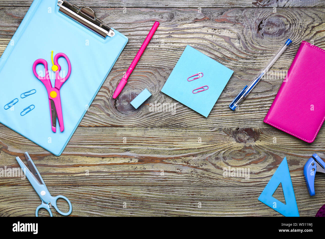 Set of school supplies on wooden background Stock Photo - Alamy
