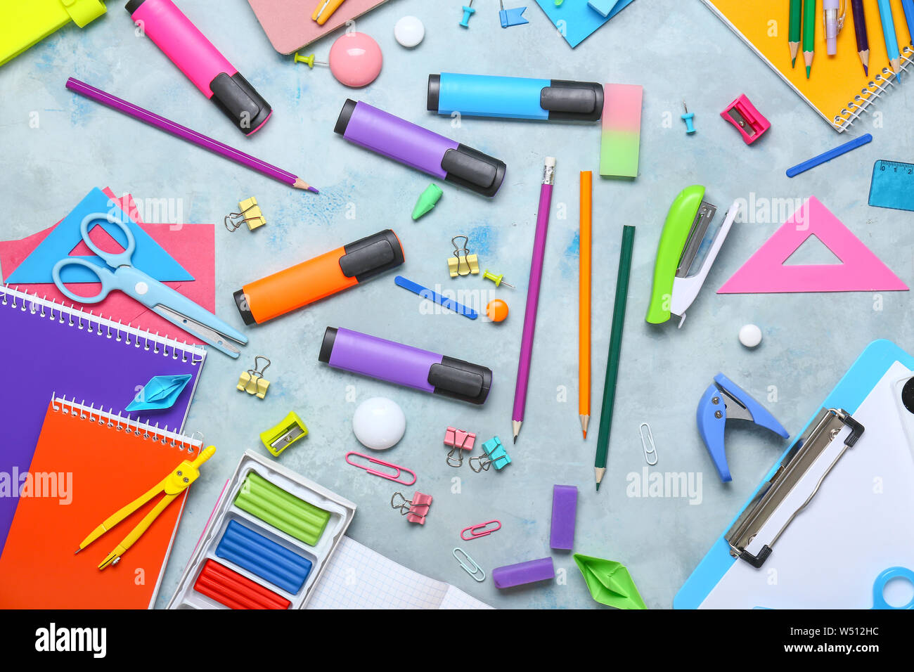Set of school supplies on color background Stock Photo - Alamy