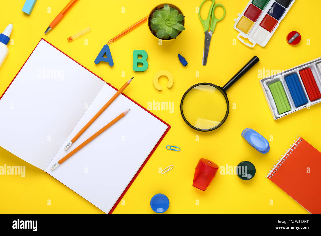Set of school supplies on color background Stock Photo - Alamy