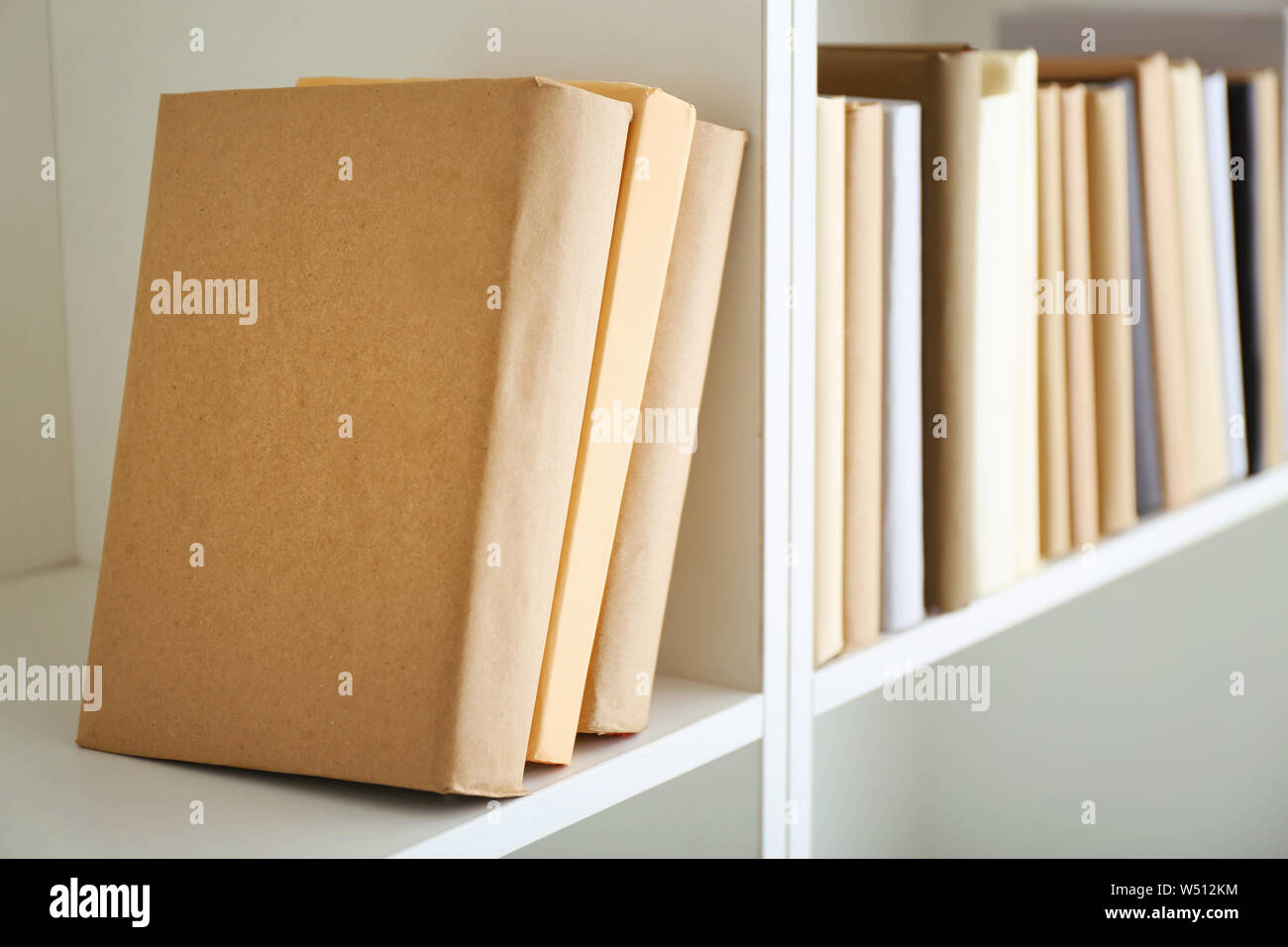 Many different books on shelf Stock Photo - Alamy