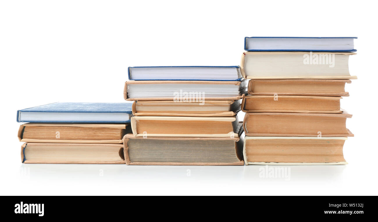 Many books on white background Stock Photo - Alamy