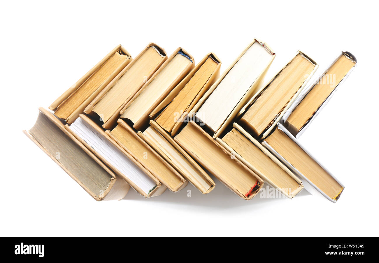 Many books on white background Stock Photo - Alamy