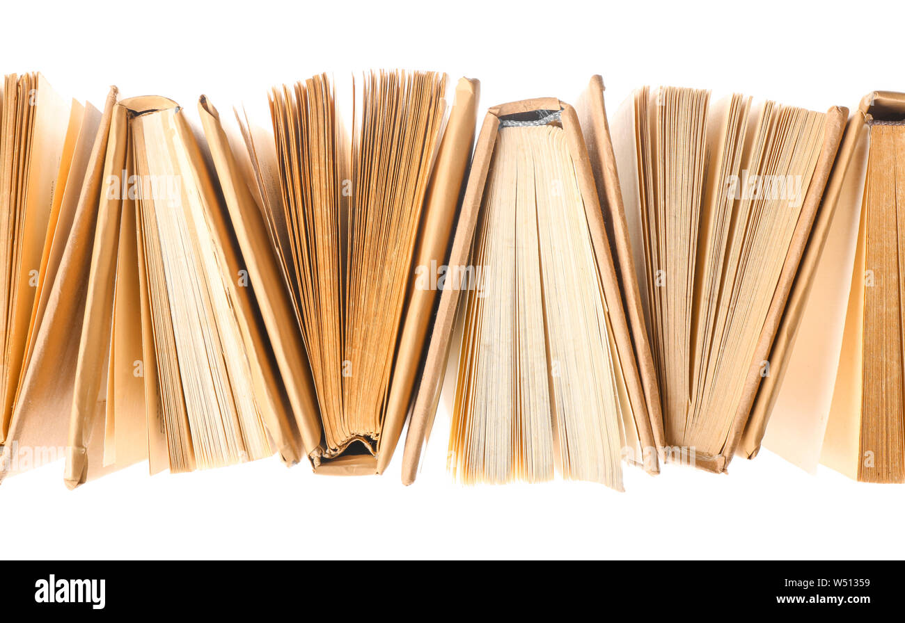 Many books on white background Stock Photo - Alamy