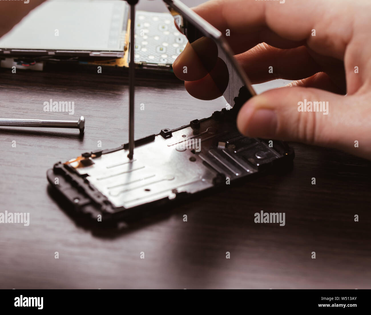 Man hands screwdriver repair hi-res stock photography and images - Alamy