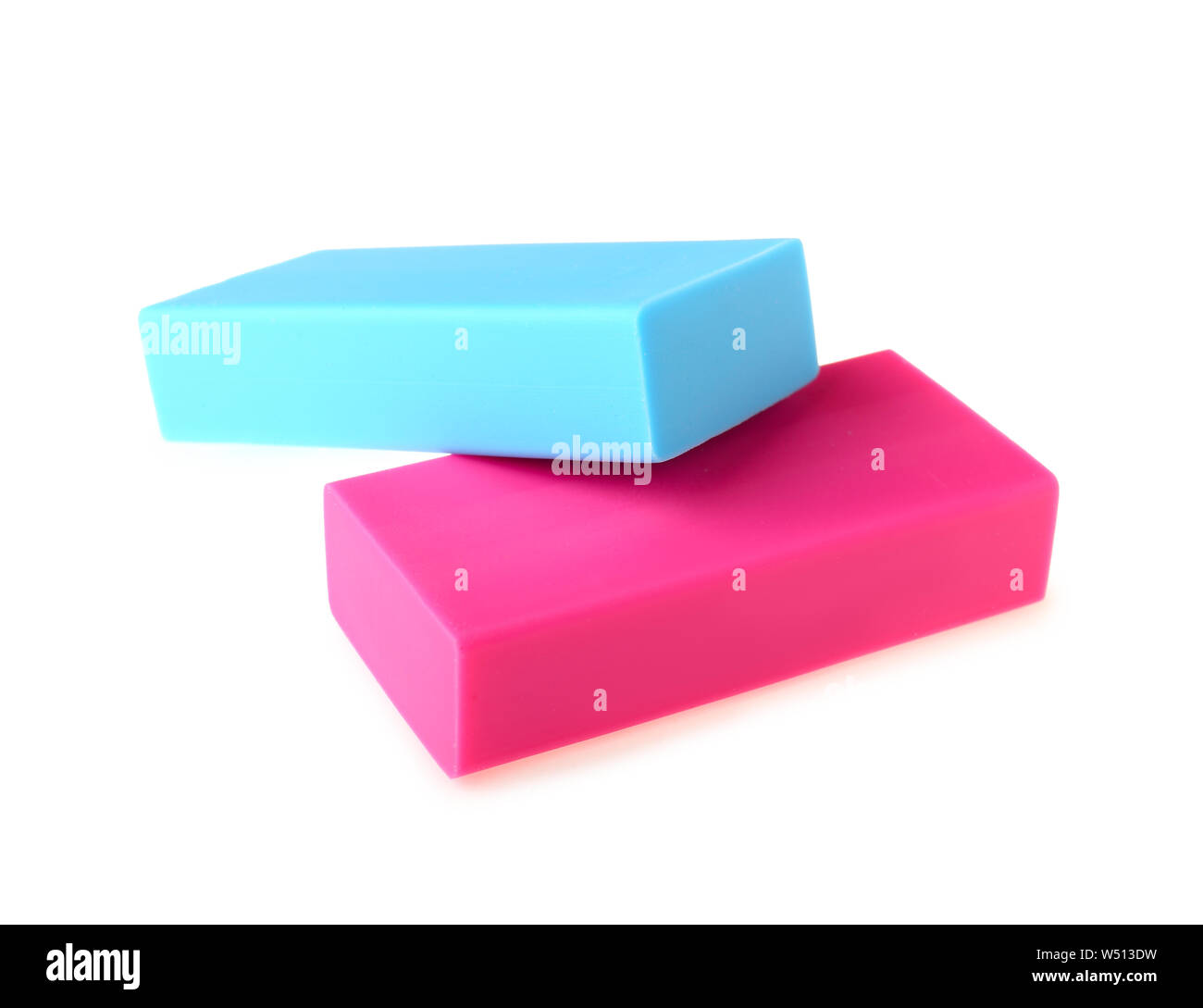 Color erasers on white background Stock Photo - Alamy