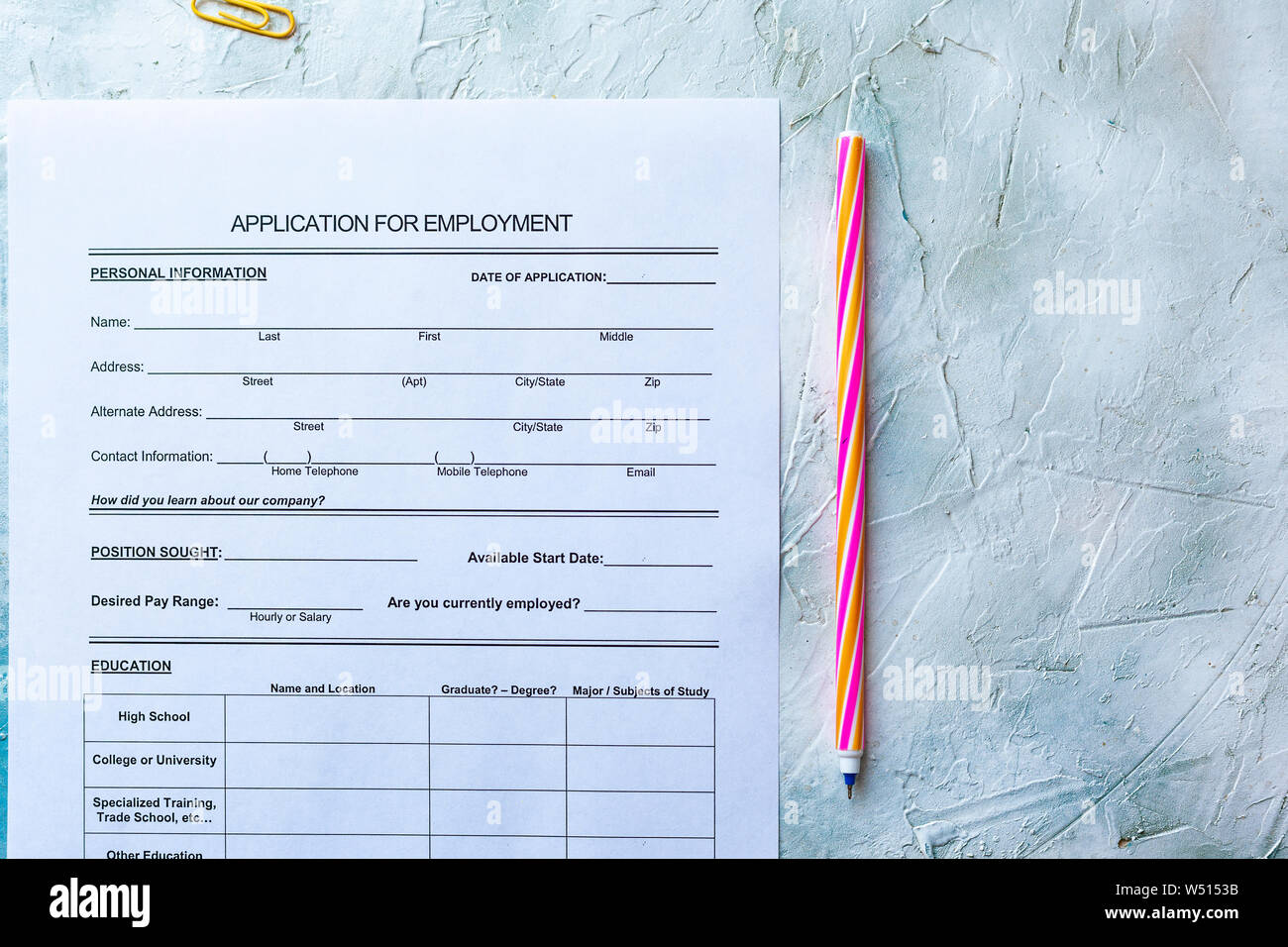 Hand filling Standard Application for Employment. HR, Hiring, Applicant ...