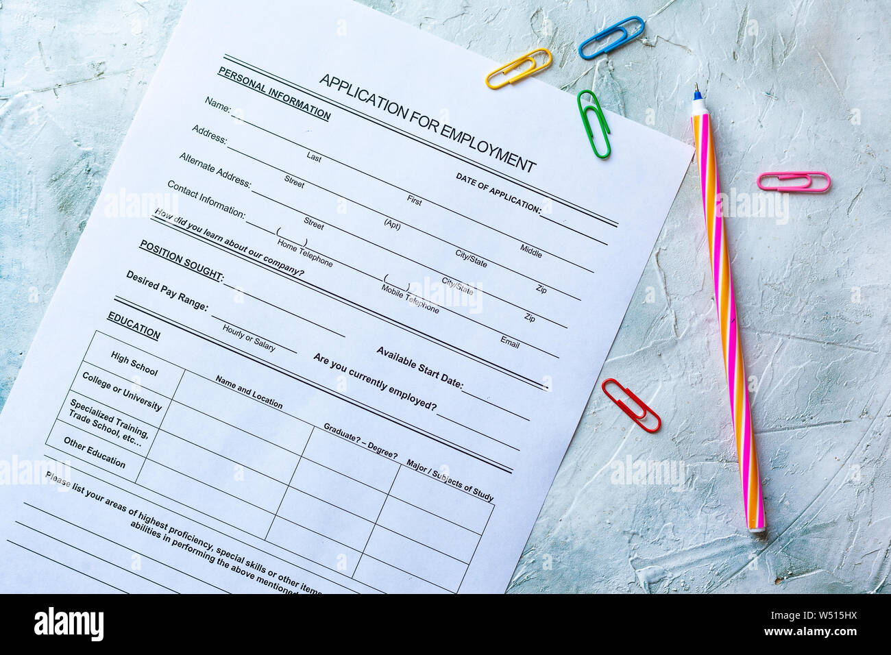 Hand filling Standard Application for Employment. HR, Hiring, Applicant ...