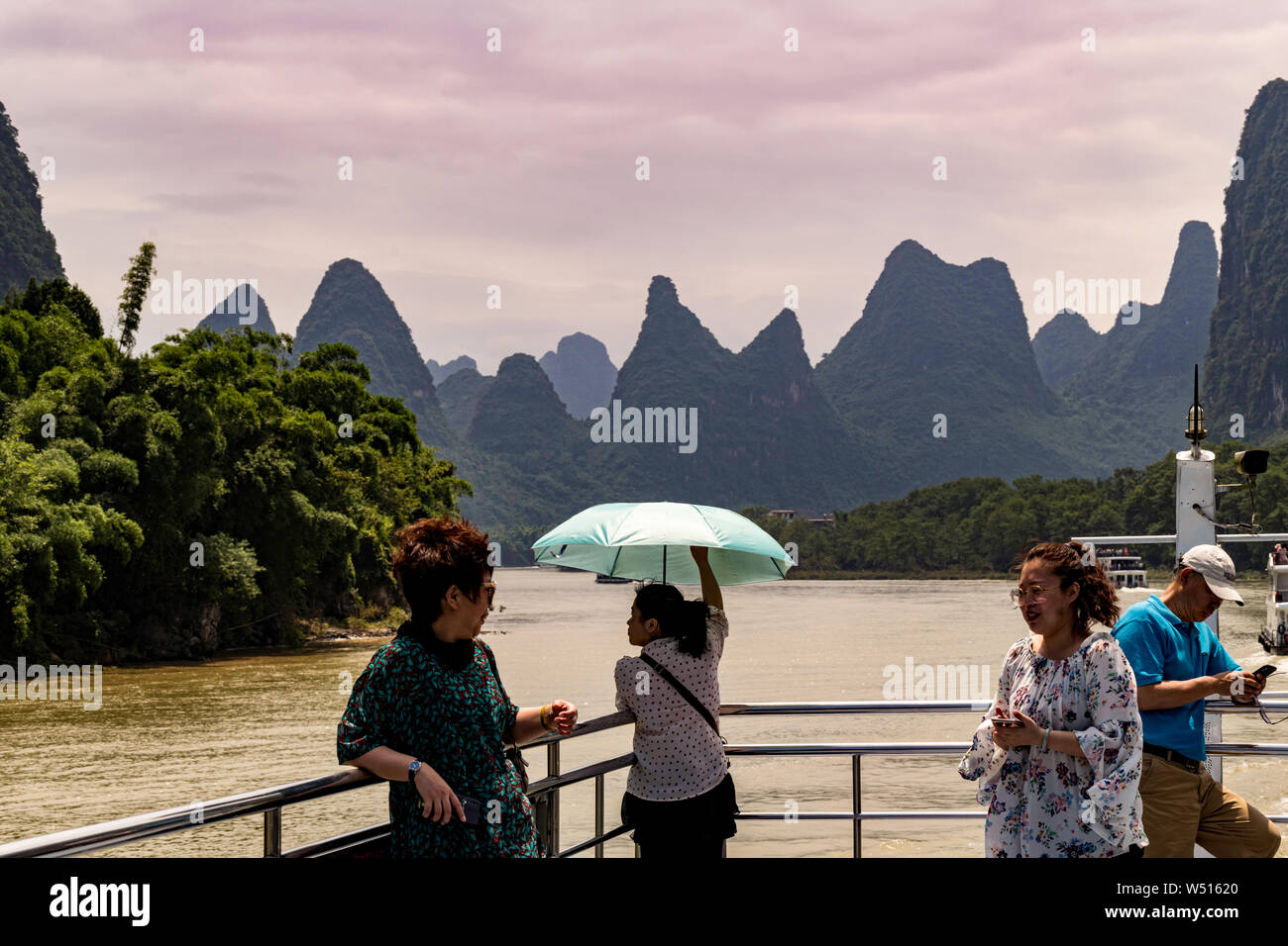 All aboard Li river cruise Guilin China, famous Stock Photo - Alamy