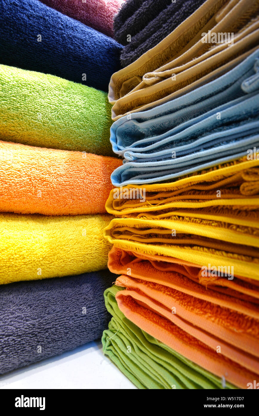 Stacks of colorful bath towels Stock Photo - Alamy