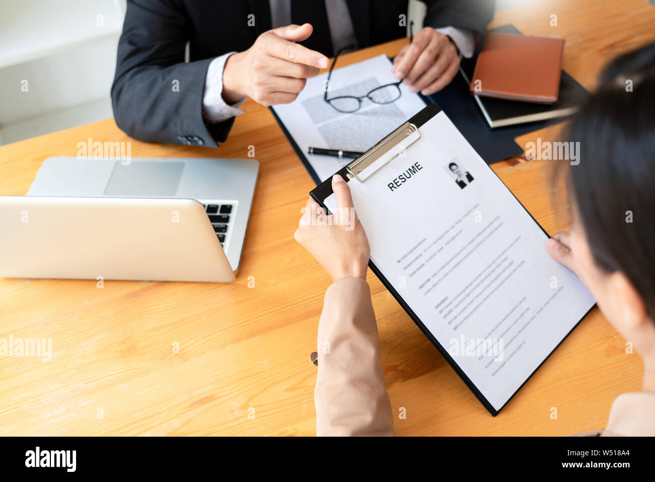businessman candidate explaining about his profile and conducting a job ...