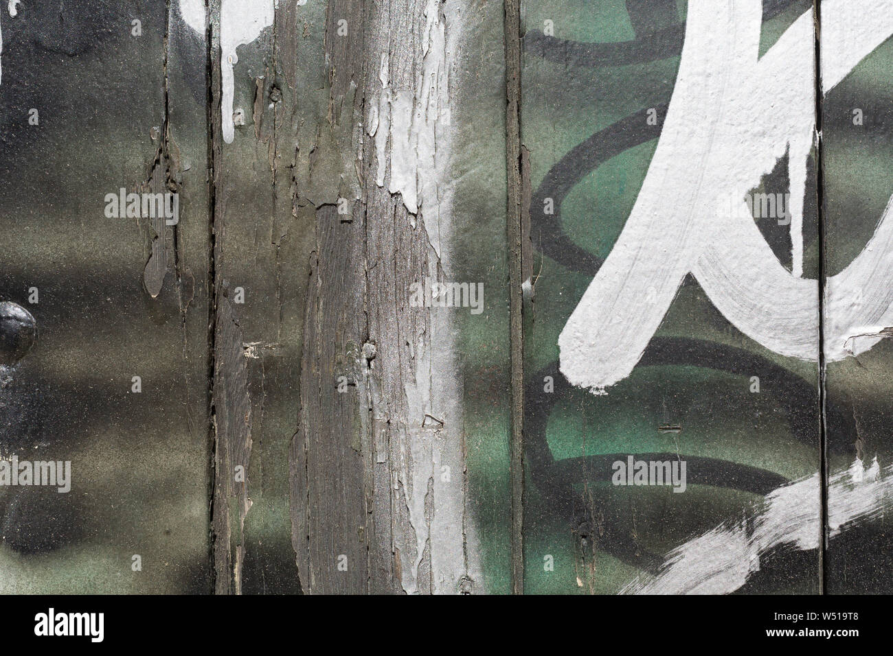 Paint on wood gate to yard, Bateman's Row, London, EC2, Britain Stock ...