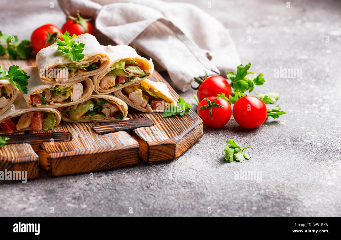 Lavash rolls with chicken and vegetables Stock Photo - Alamy