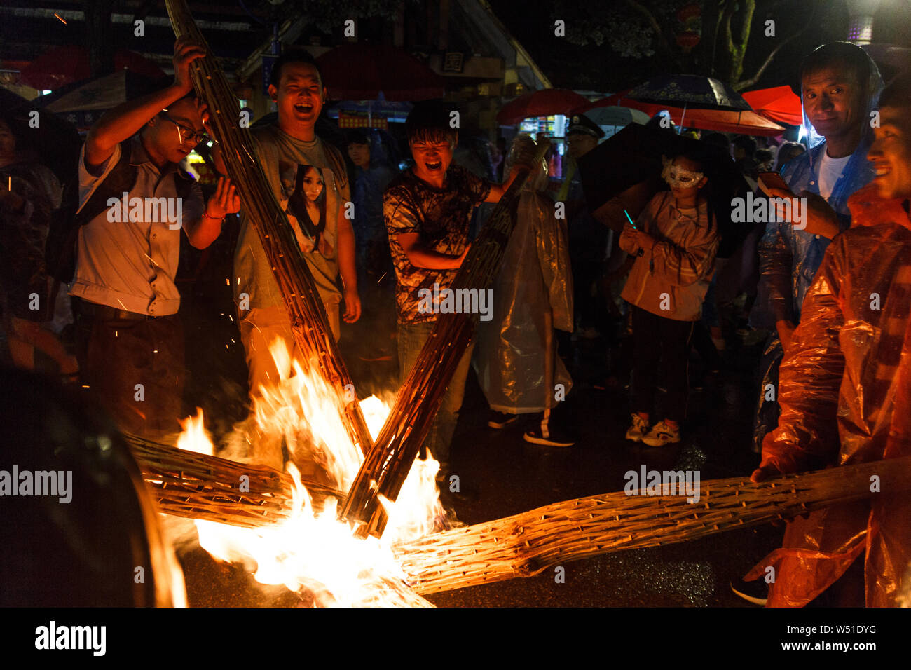 People with torches forest hi-res stock photography and images - Alamy