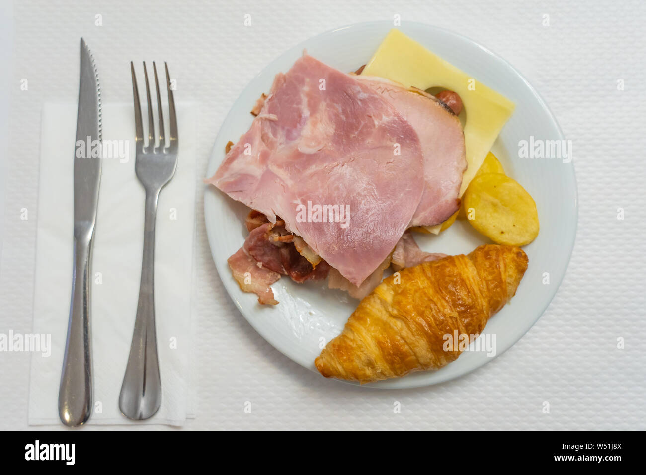 Typical European breakfast meal with croissant and ham Stock Photo - Alamy