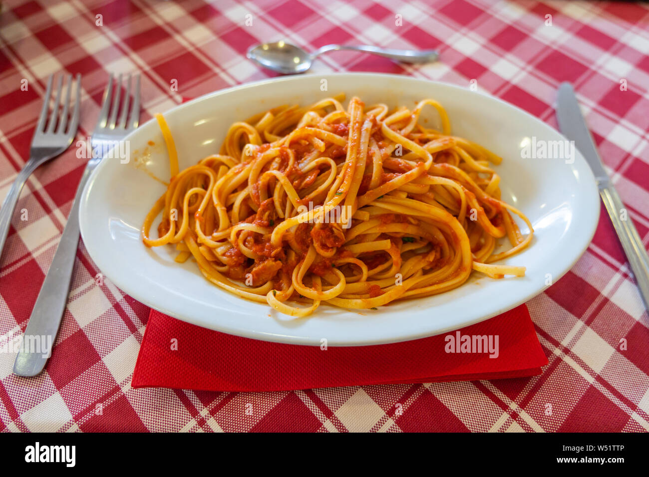 Spaghetti mixed with minced meat and tomato ketchup in restaurant Stock ...