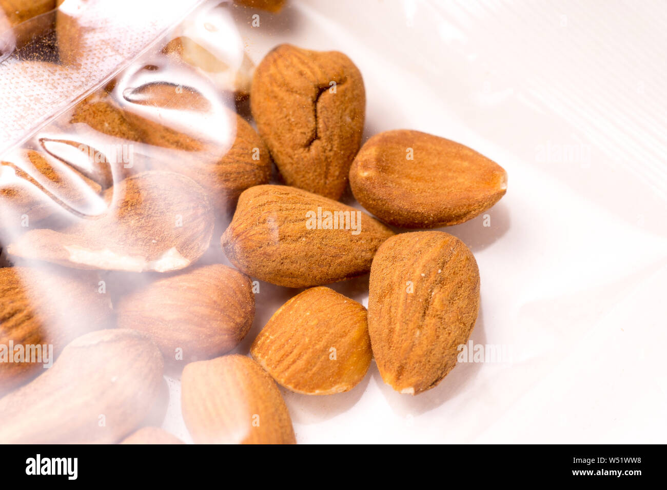 almonds packages in plastic packaging isoalted on white background ...