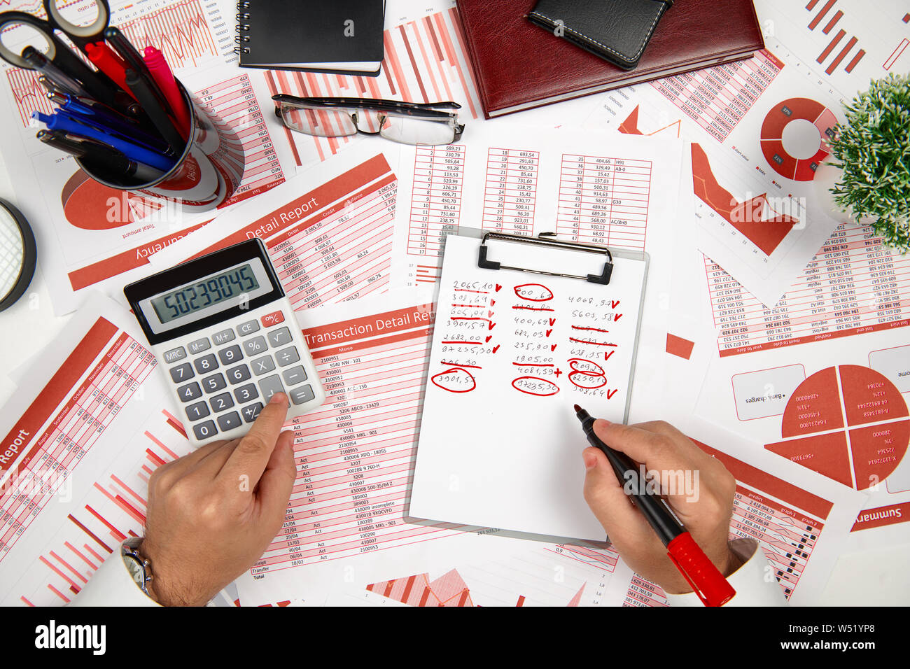 Business reports, data tables and charts - directly above view of ...