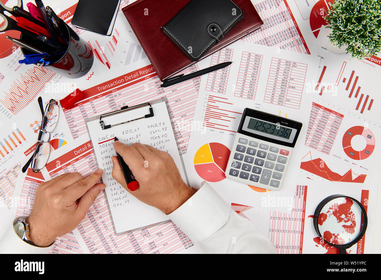 Business reports, data tables and charts - directly above view of ...