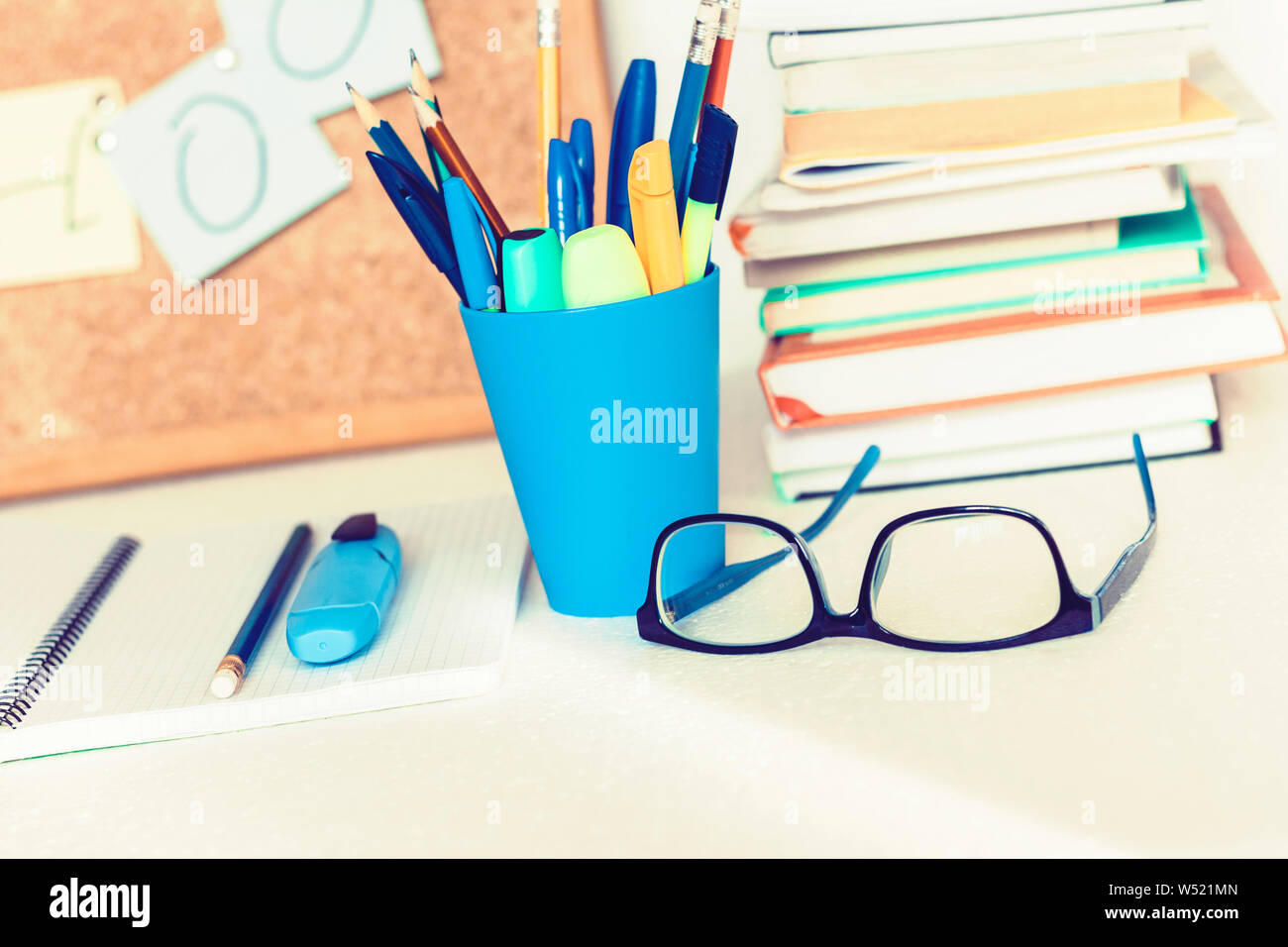 Back to school background. Stationery accessories – notebooks piles ...
