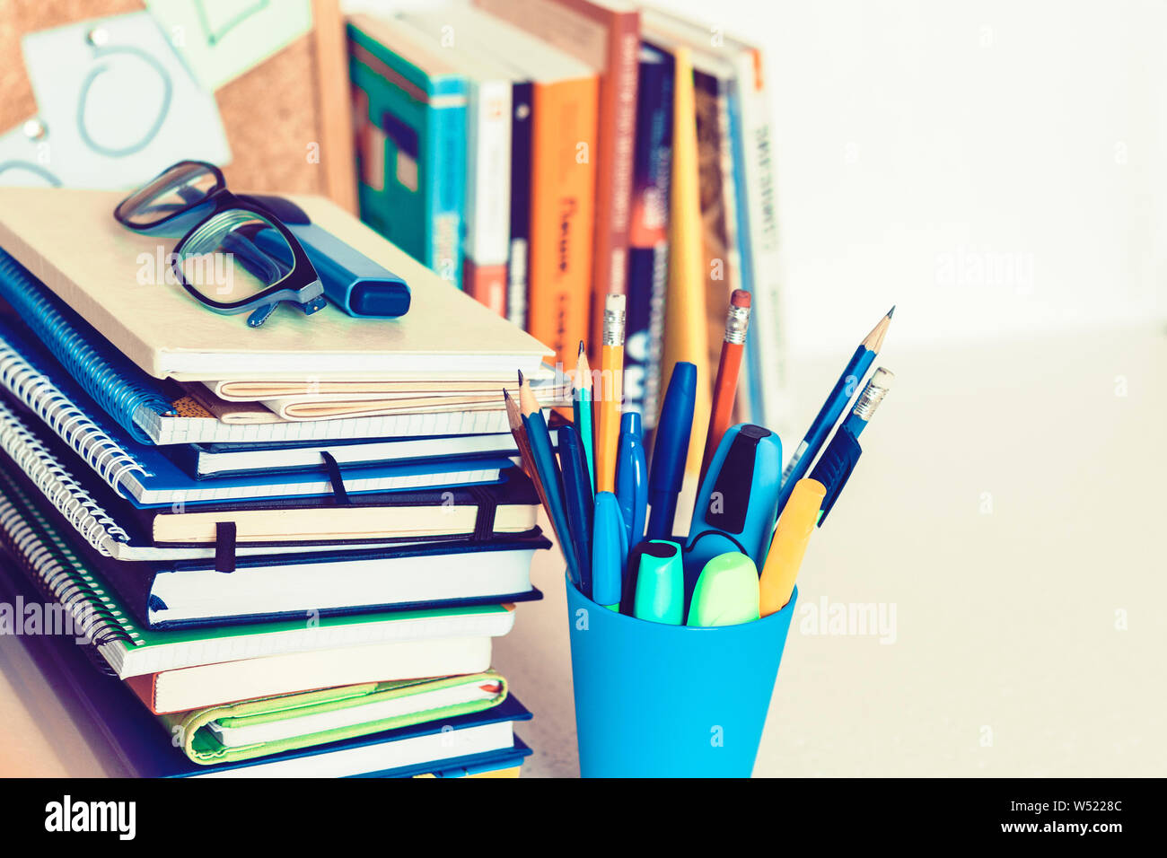 Notebooks piles, stack of books education back to school background ...