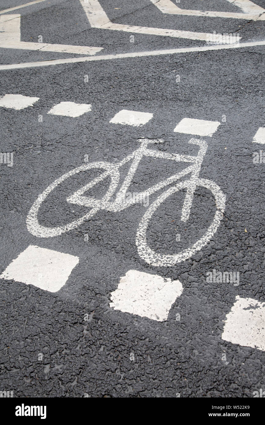 Bike Path Symbol on Urban Street Stock Photo - Alamy