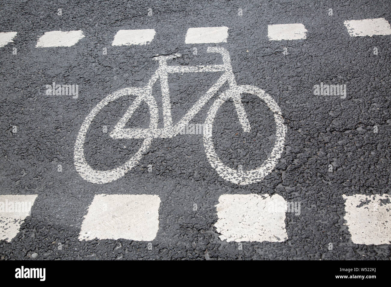 Bike Lane Symbol on Street Stock Photo - Alamy