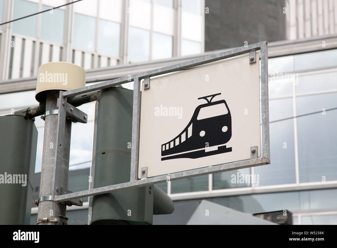 Train Warning Sign in Urban Setting Stock Photo - Alamy