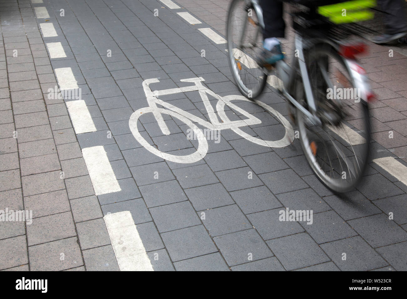 Cycle Path Symbol and Cyclist; Frankfurt; Germany Stock Photo - Alamy