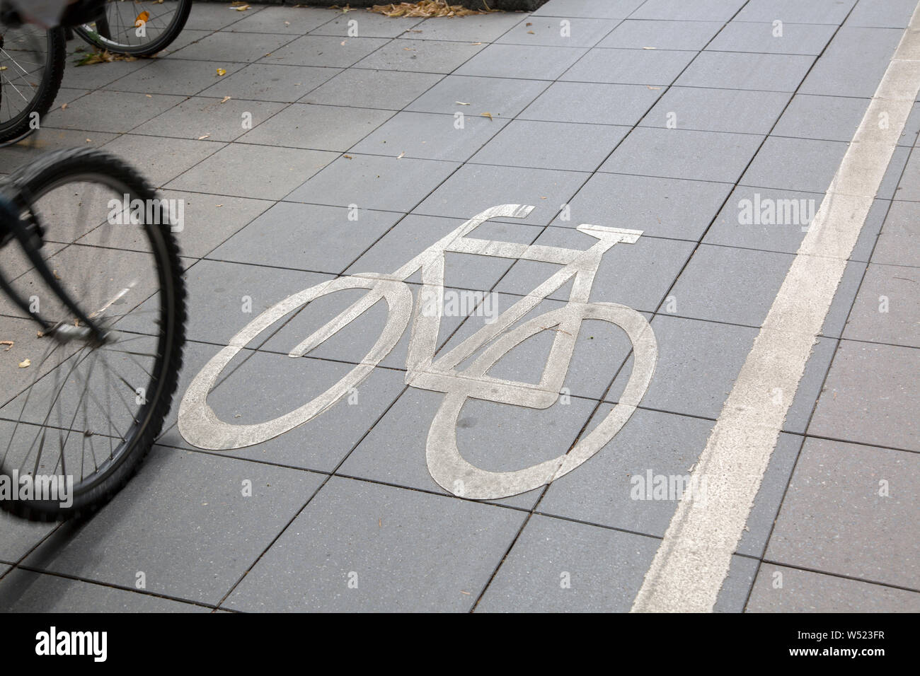 Bike Path Symbol and Cyclist; Frankfurt; Germany Stock Photo - Alamy