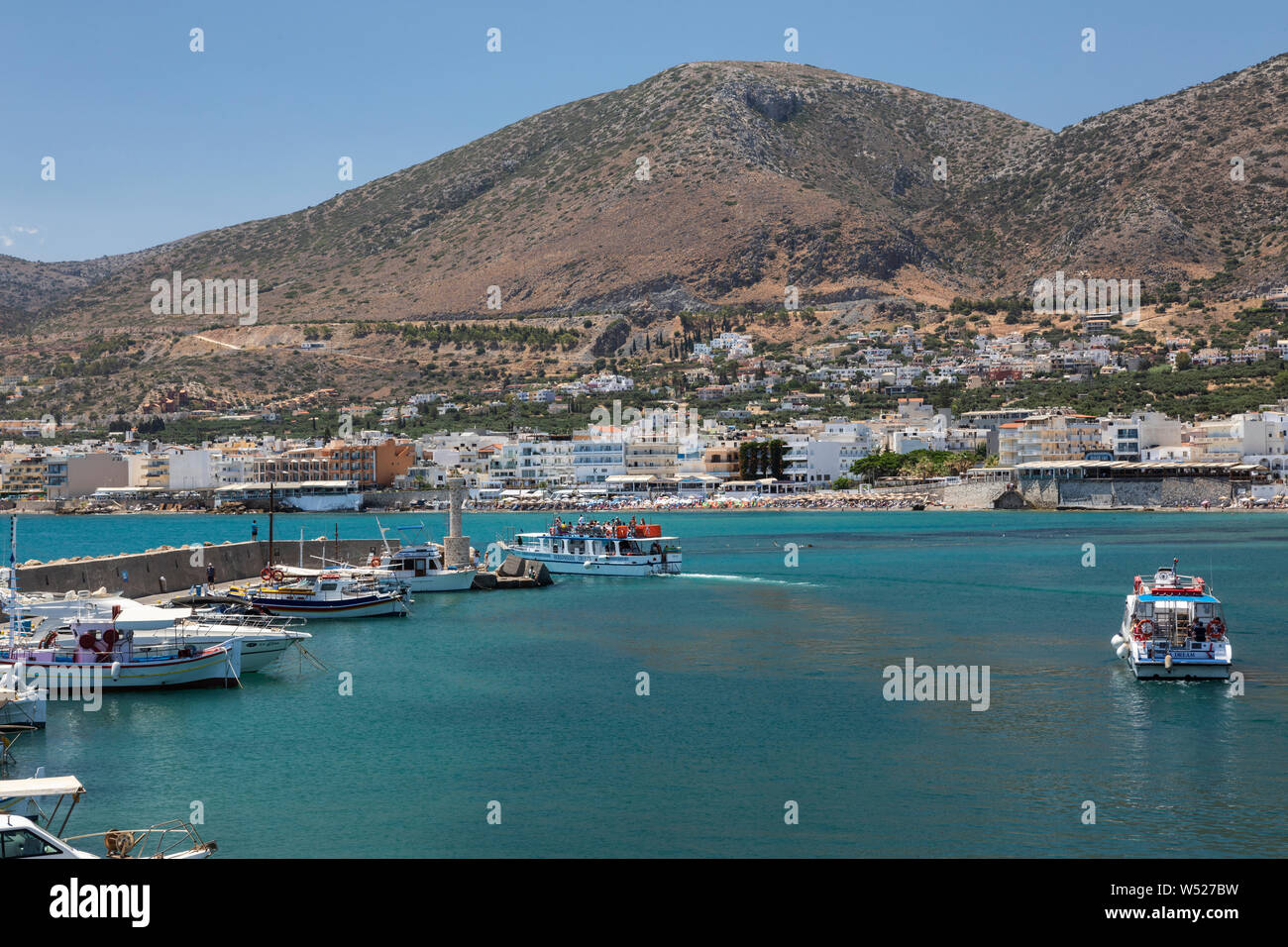 Hersonissos harbour, Crete, Greece Stock Photo - Alamy