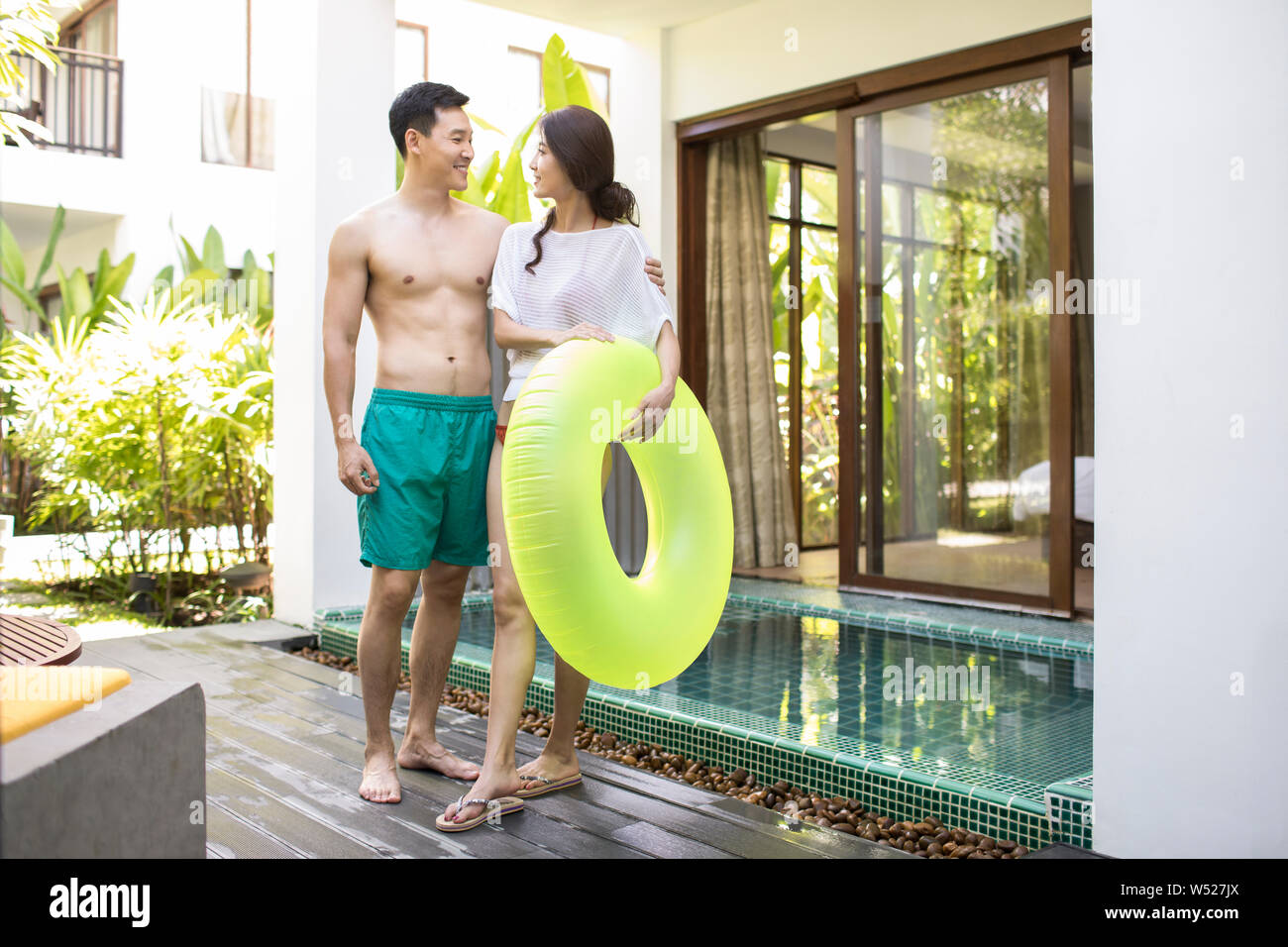 Two women at poolside hi-res stock photography and images - Alamy